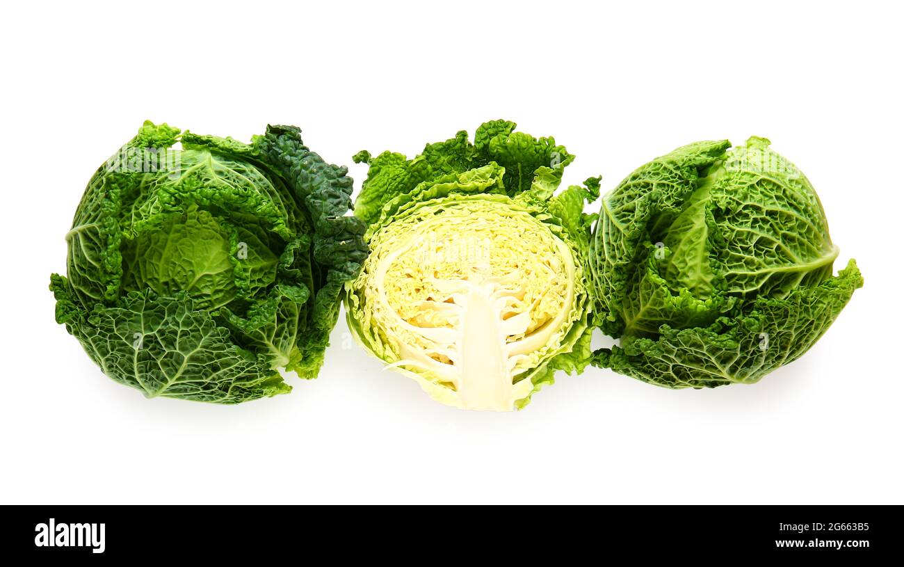 Fresh savoy cabbages on white background Stock Photo - Alamy