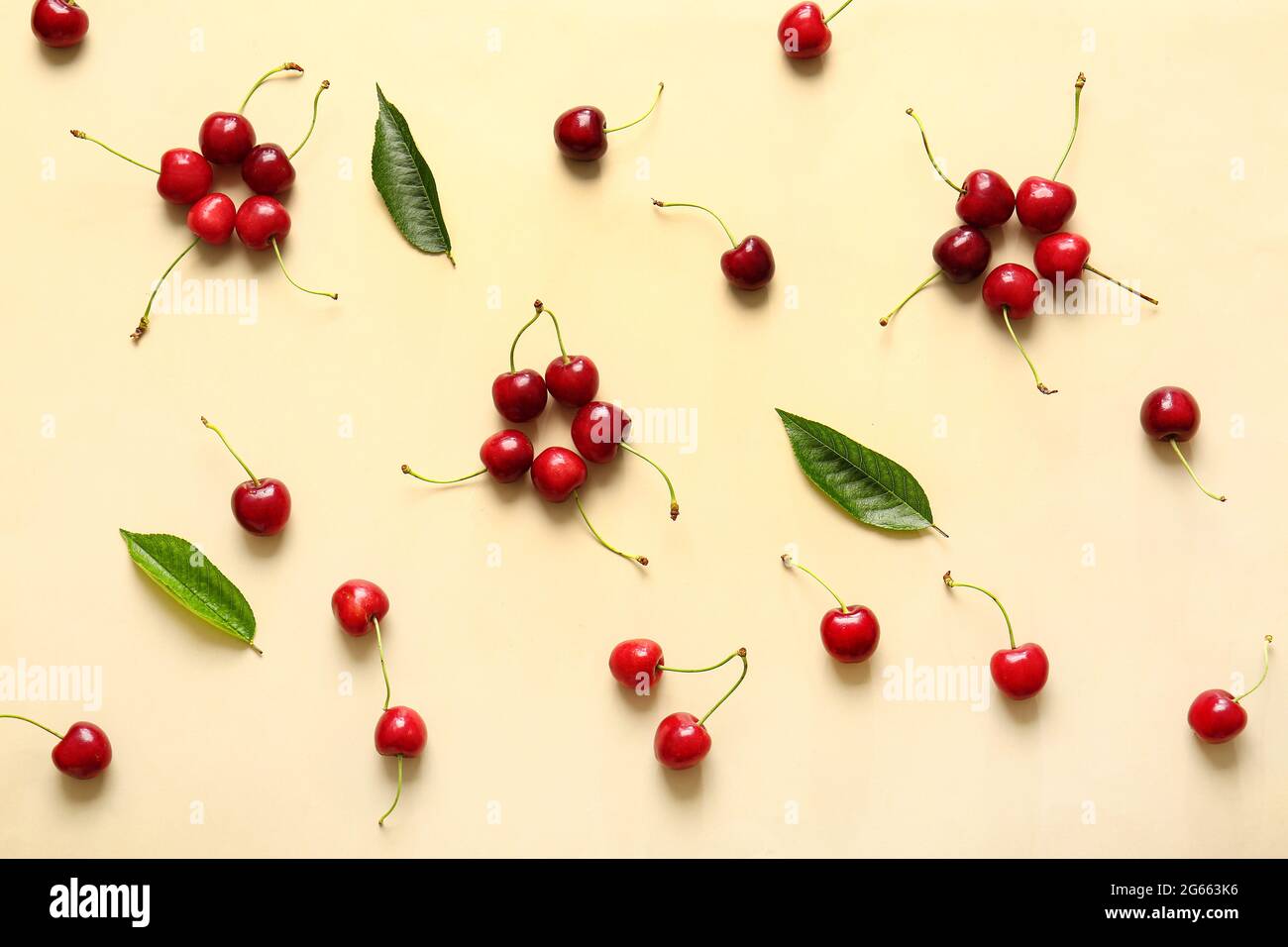 Tasty ripe cherry on color background Stock Photo - Alamy
