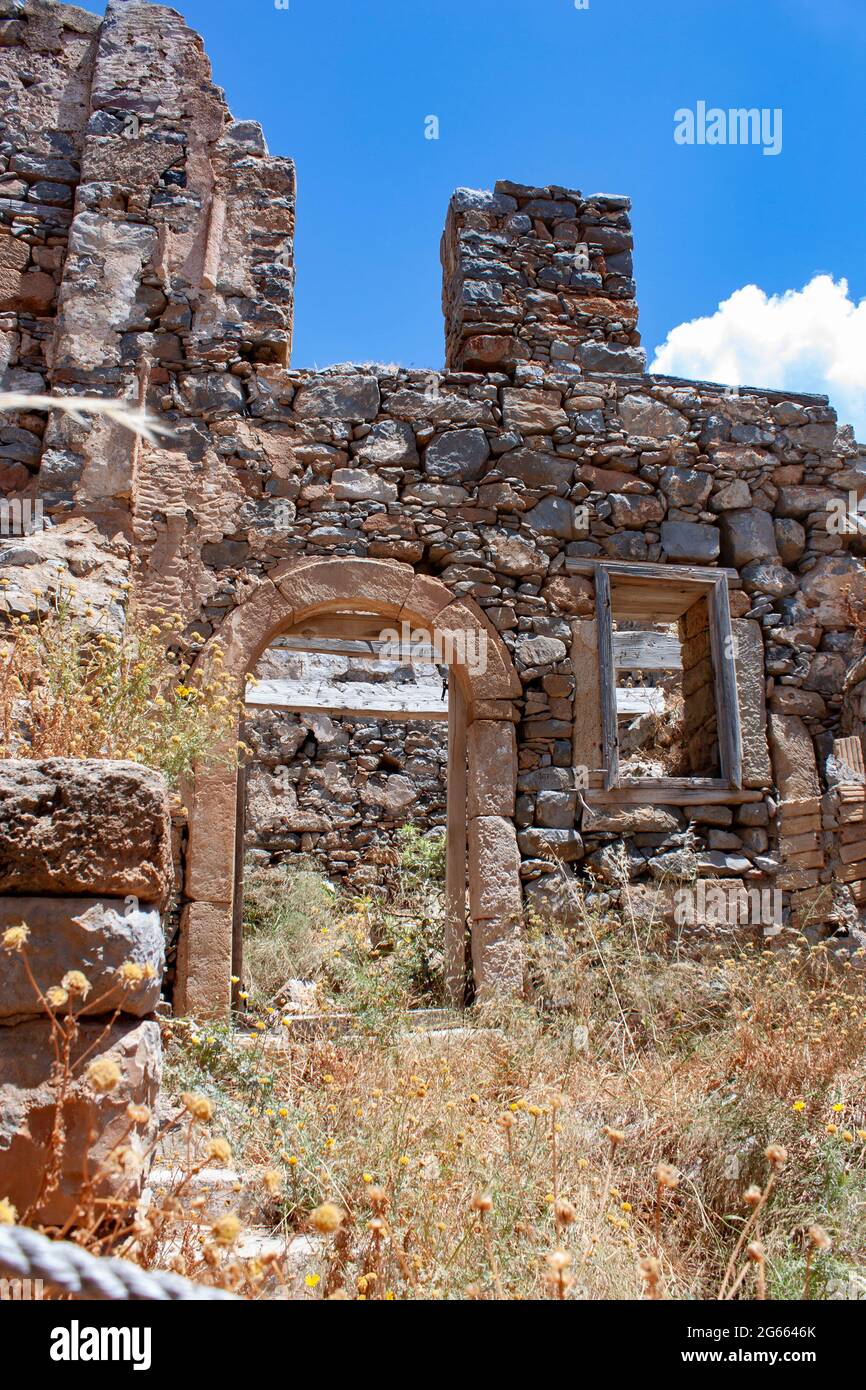 Abandoned old fortress and former leper colony, island Spinalonga ...