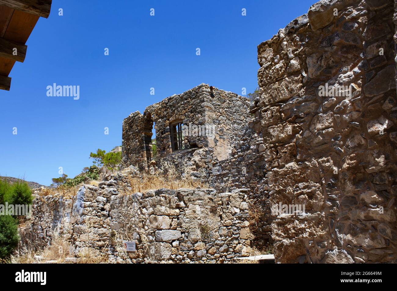 Abandoned old fortress and former leper colony, island Spinalonga ...