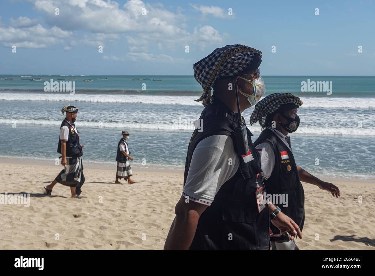 Badung, Bali, Indonesia. 3rd July, 2021. Balinese traditional police of ...