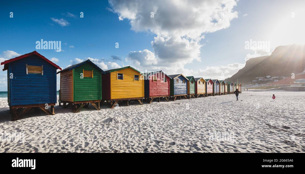 Colorful beach cabins at sunset in Muizenberg, Cape Town, South Africa ...