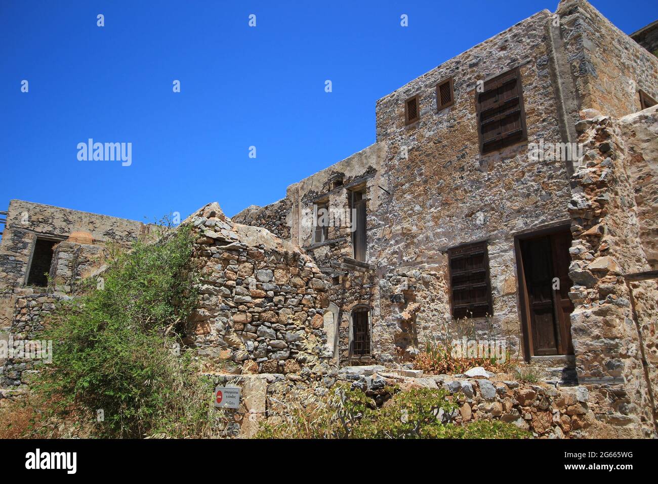 Abandoned old fortress and former leper colony, island Spinalonga ...