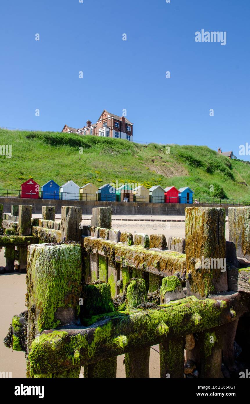 The beach and beach huts at the seaside resort of Mundesley, Norfolk ...