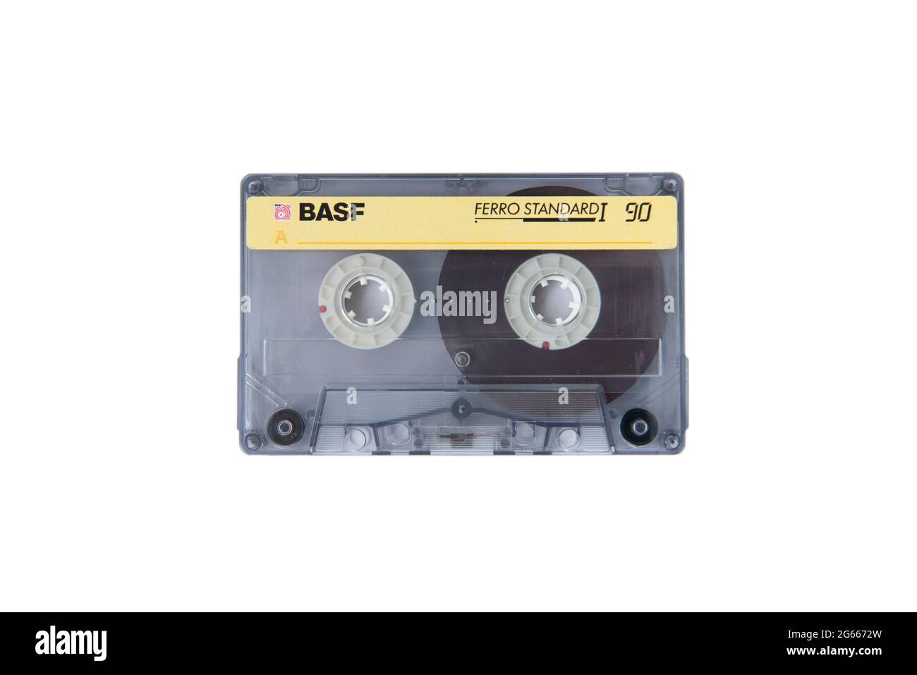 Yellow BASF audio cassette, retro audio technology, on white background ...