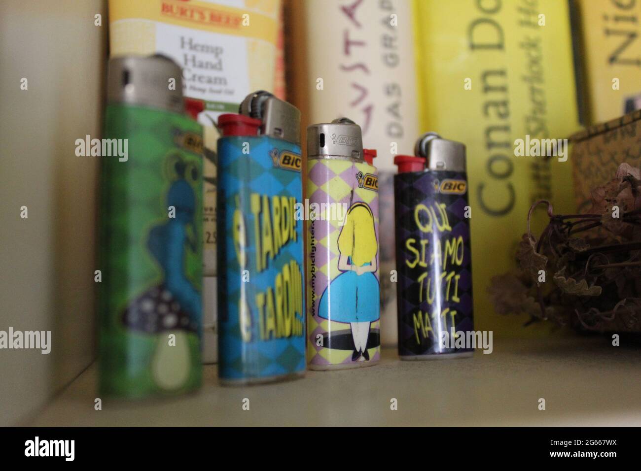 A stack of flyers on a counter Stock Photo - Alamy