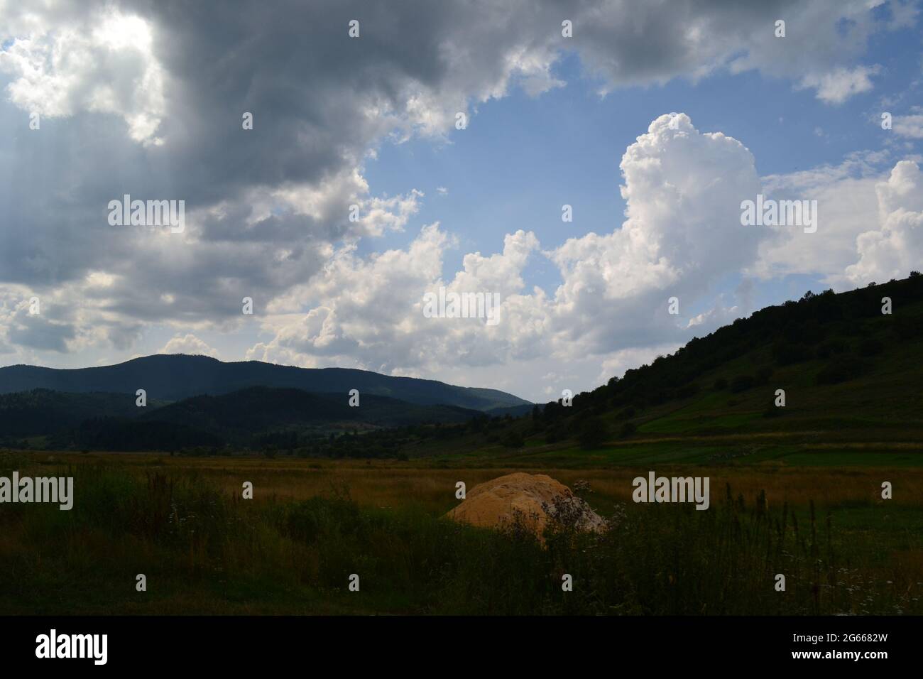 Peaceful field in mountains hi-res stock photography and images - Alamy
