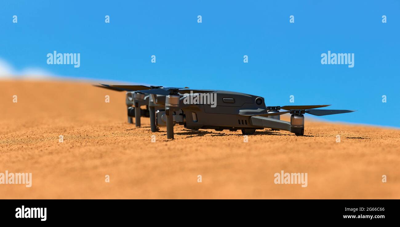 Quadrocopters are built on the sand in the desert waiting for takeoff ...