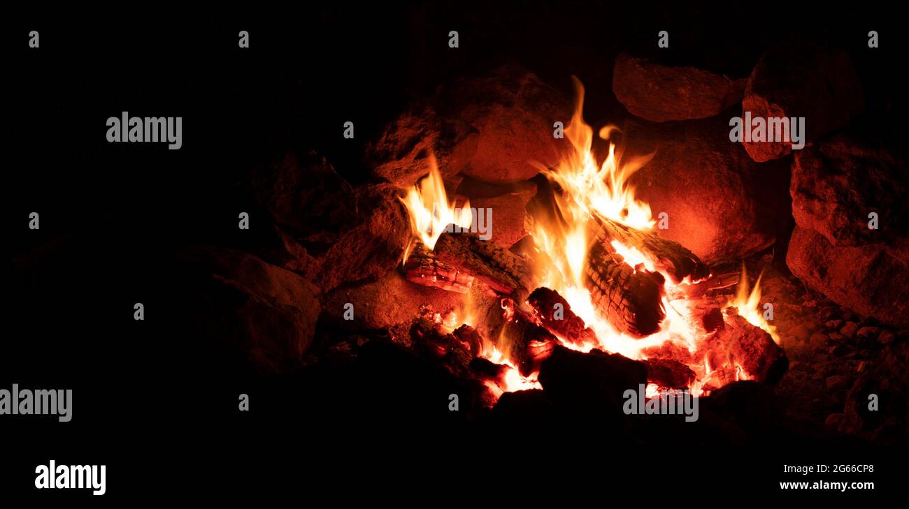 Horizontal campfire burning hot with room for text to the left Stock ...