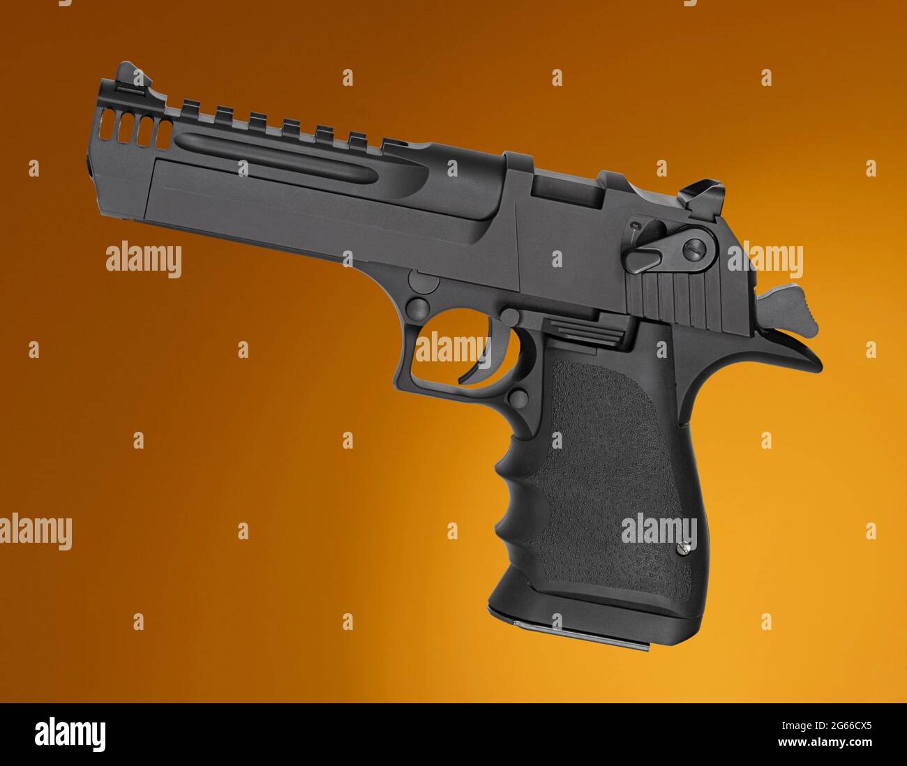 Large caliber semi-automatic handgun that is on an orange and brown ...