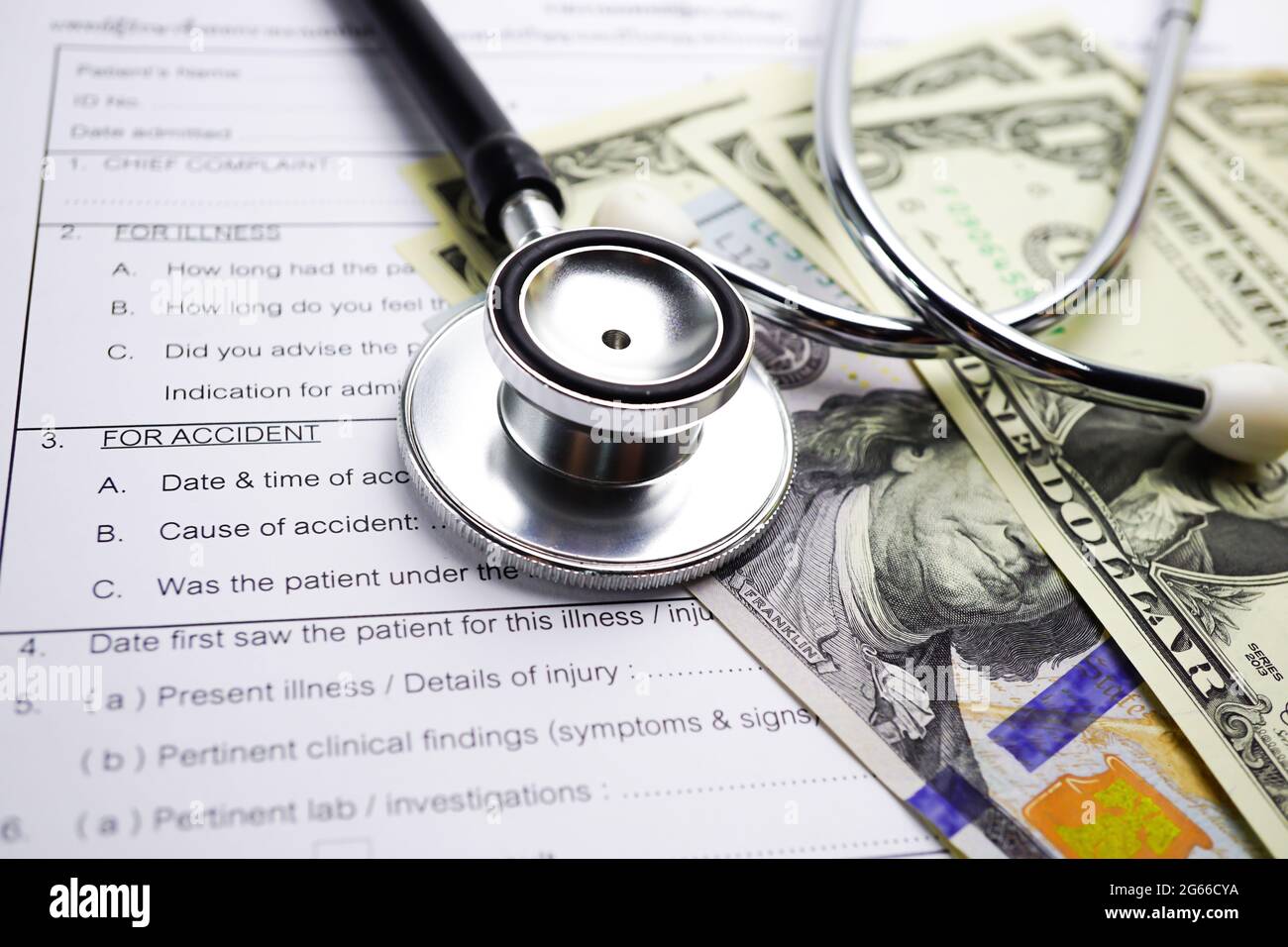 Health insurance accident claim form with stethoscope and US dollar ...