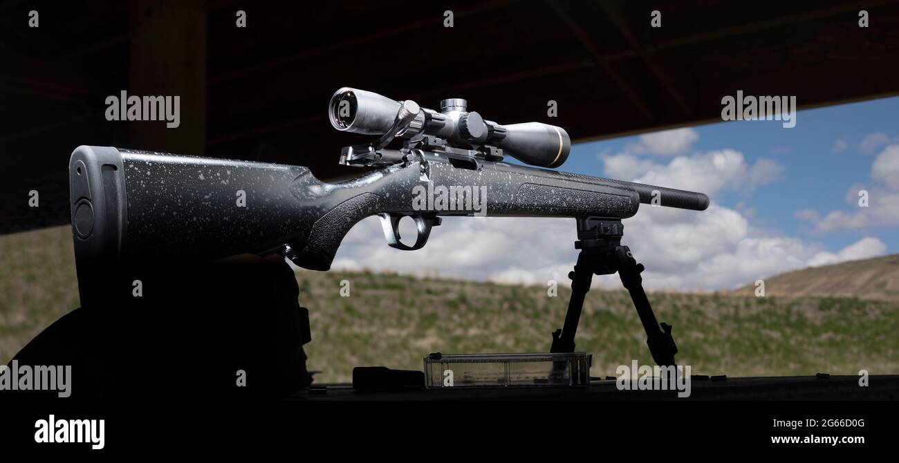 Bolt action rimfire rifle on a shooting bench at the range Stock Photo ...