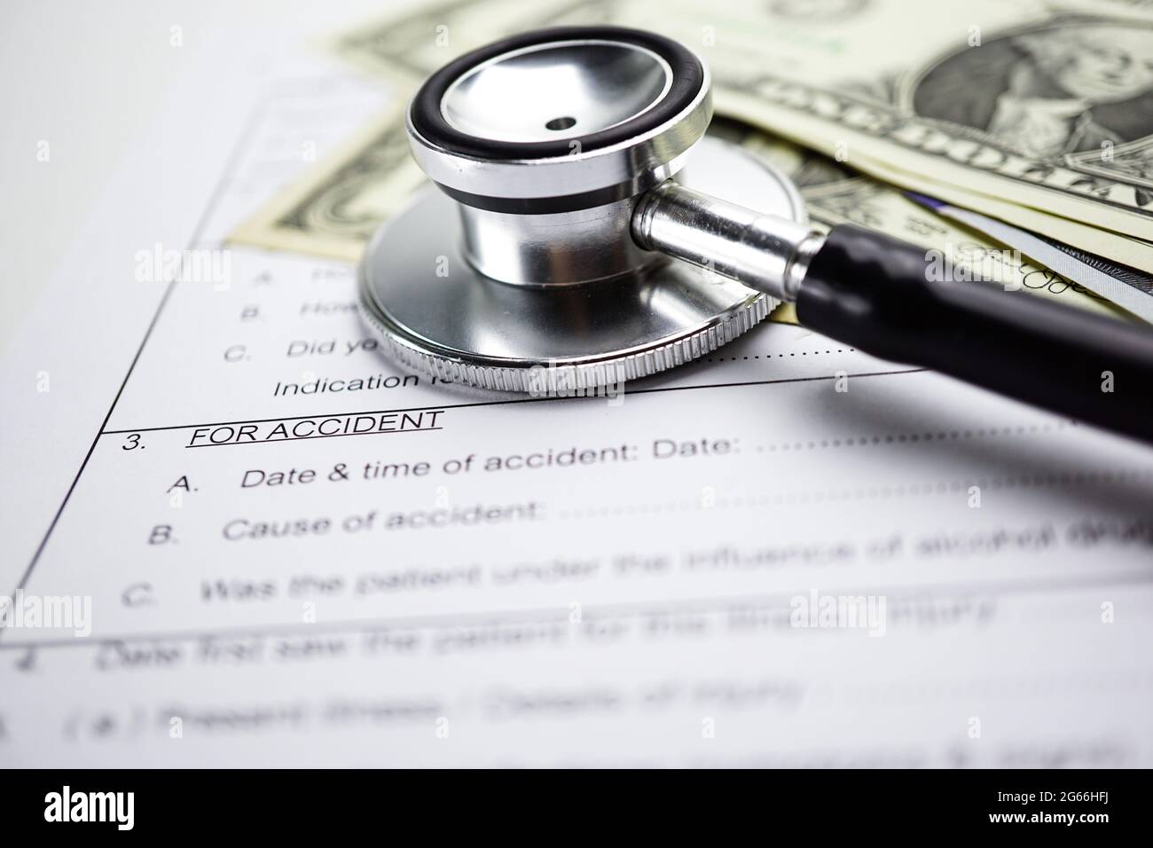 Health insurance accident claim form with stethoscope and US dollar ...