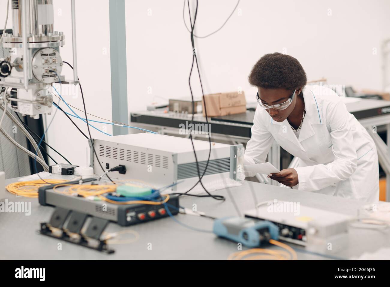 Scientist african american woman work in laboratory with electronic ...