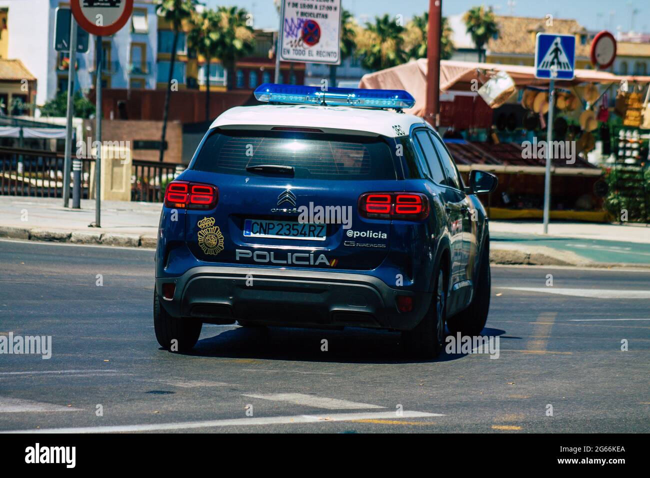 Seville Spain July 02, 2021 Police car patrolling in the streets of ...