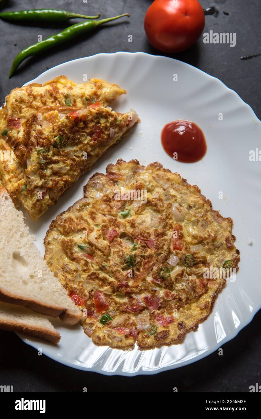 Cutting up omelette hi-res stock photography and images - Alamy