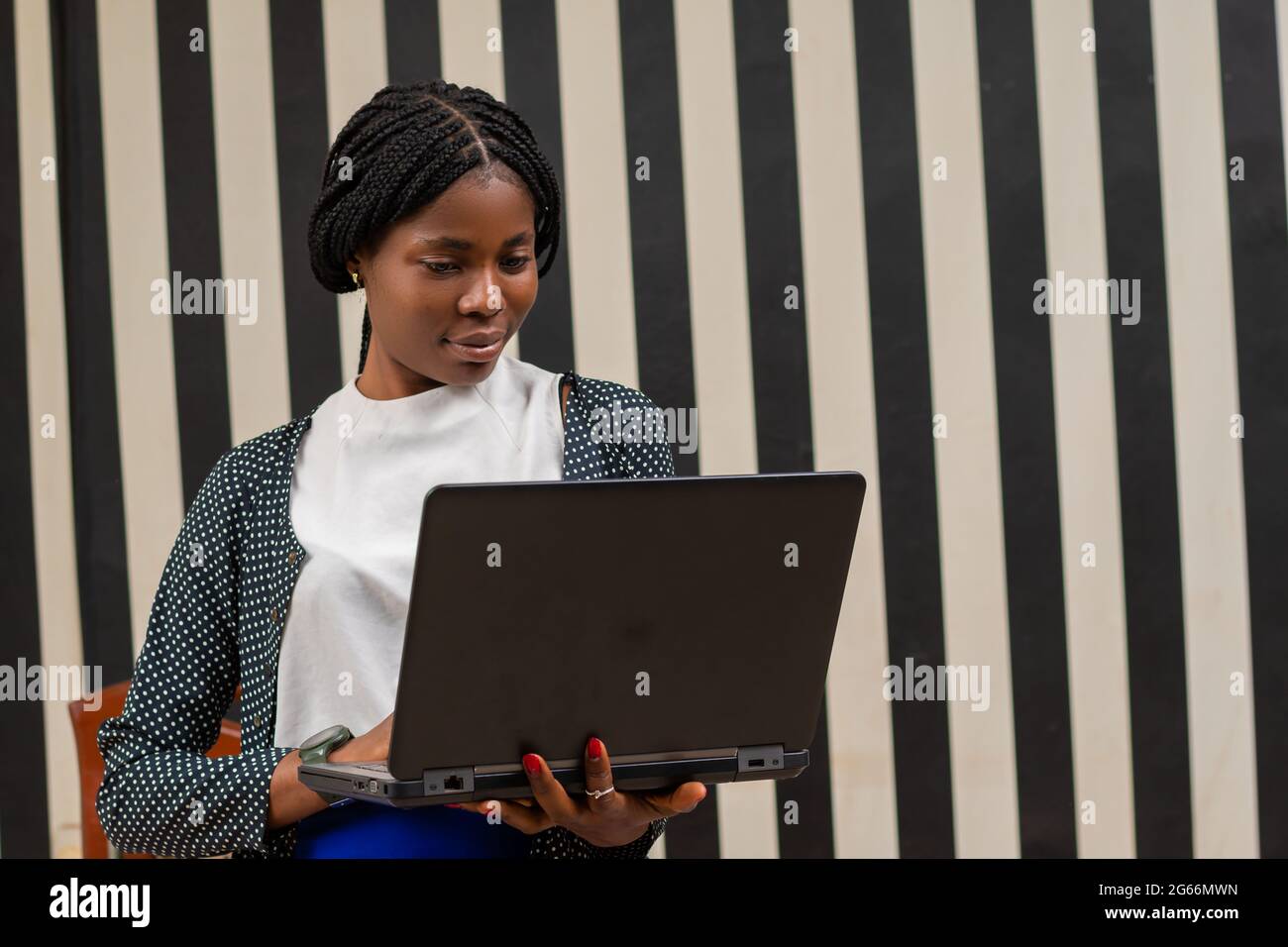 overexcited african lady in the office Stock Photo - Alamy