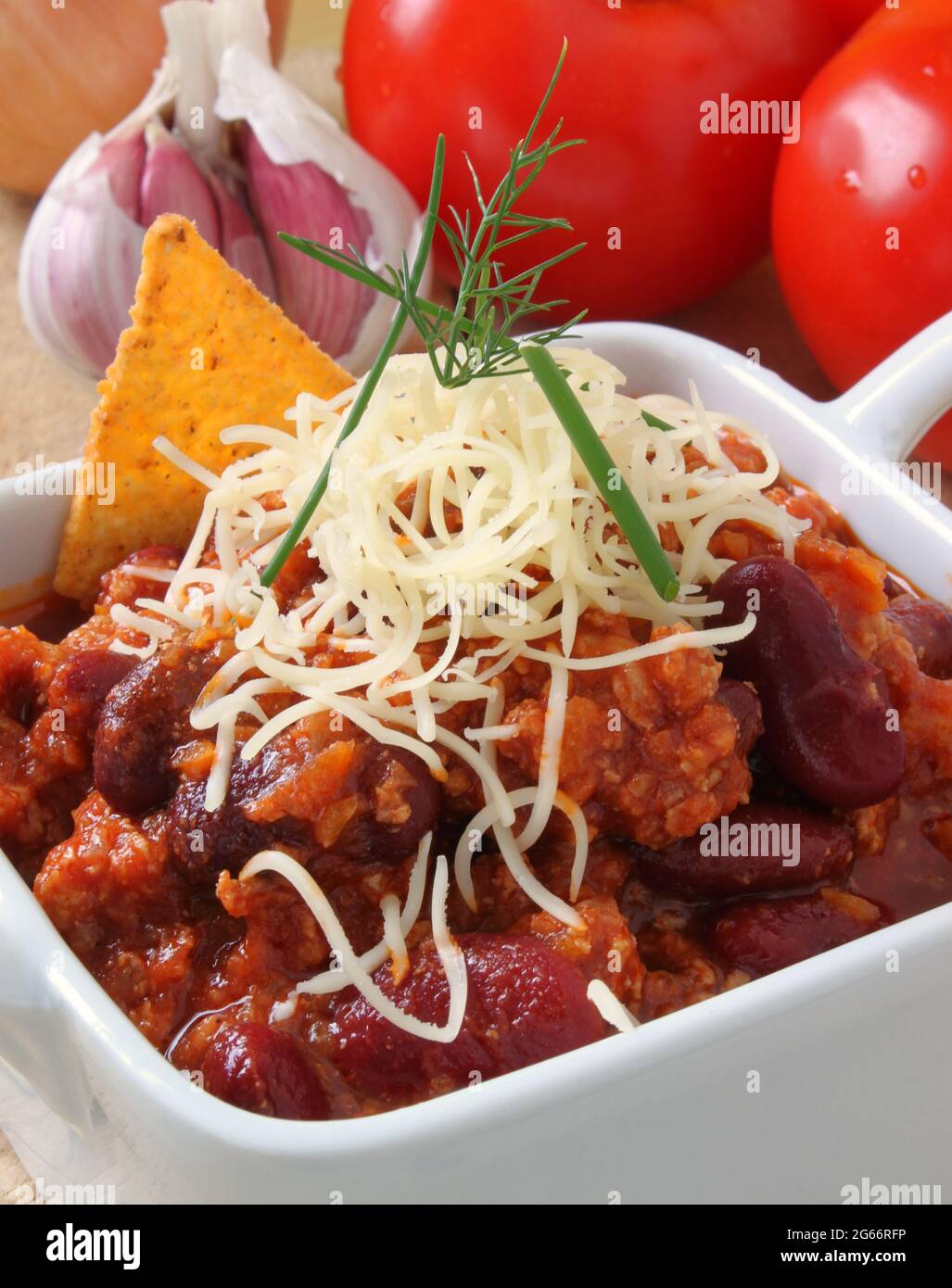 Freshly cooked chilli con carne, topped with cheese Stock Photo - Alamy