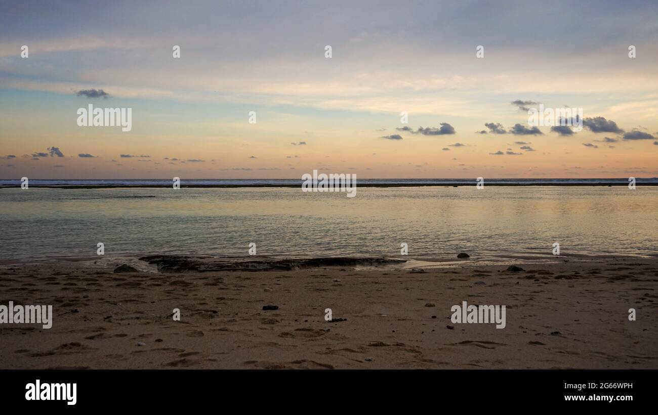 Beautiful beach landscape at sunset Stock Photo - Alamy