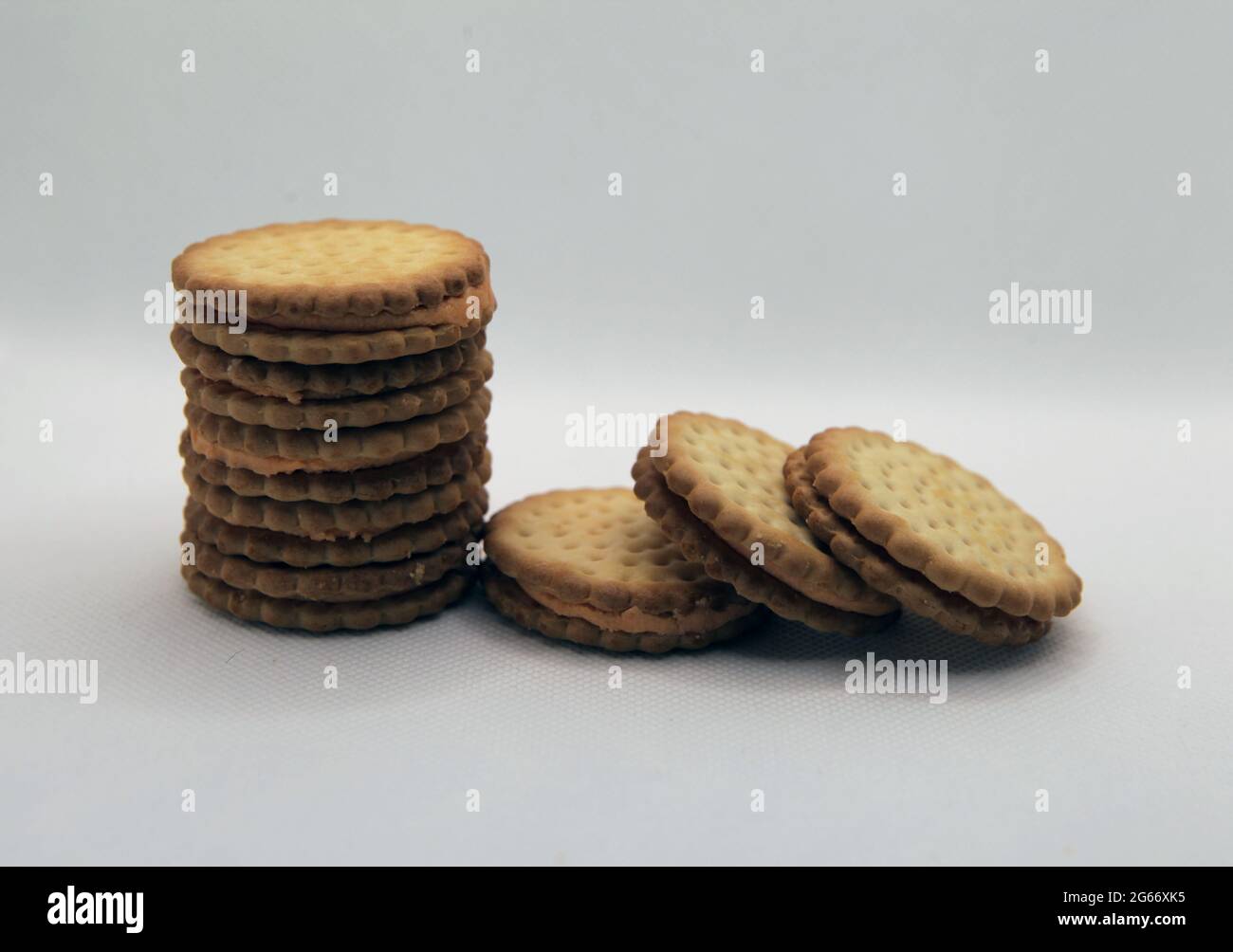 Group shoot of stacked biscuits isolated white background Stock Photo ...