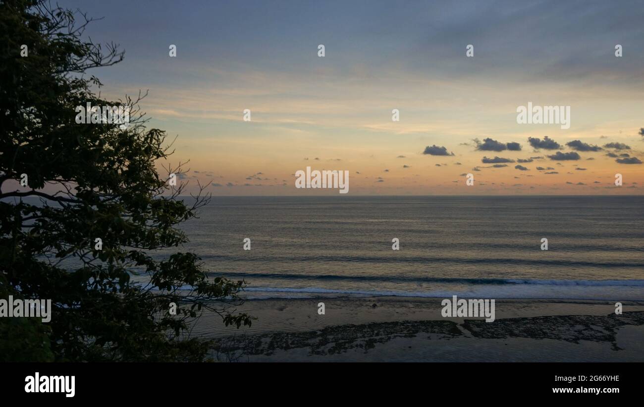 Beautiful beach landscape at sunset Stock Photo - Alamy