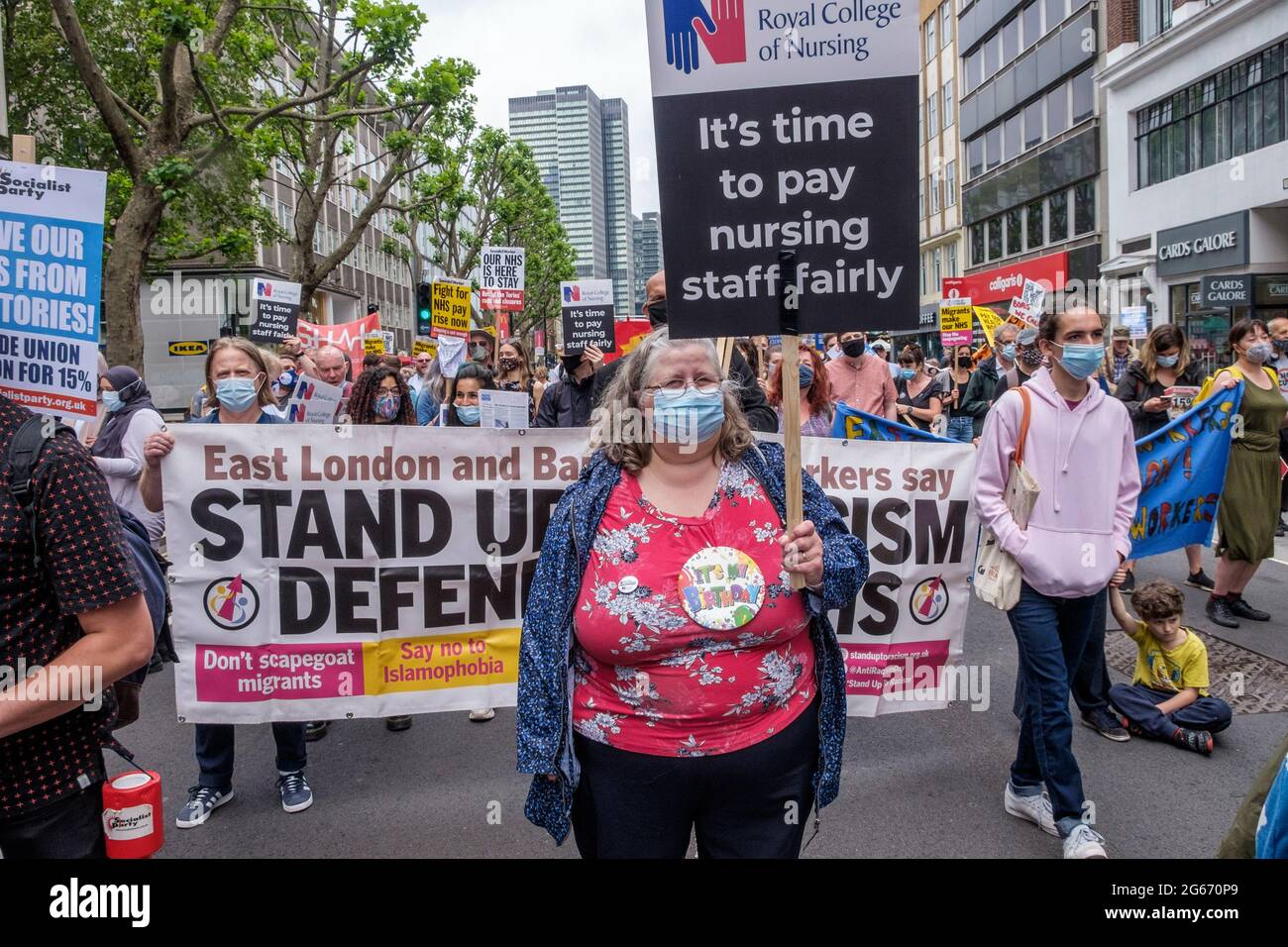 London, UK. 3rd July 2021. Campaigners march to a rally at the start of ...