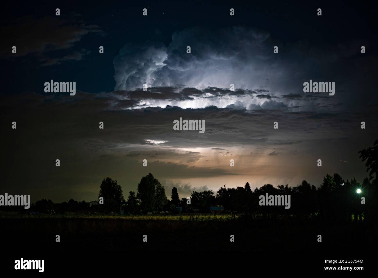 Landscape with Lightnings thunderstorm clouds and night Stock Photo - Alamy
