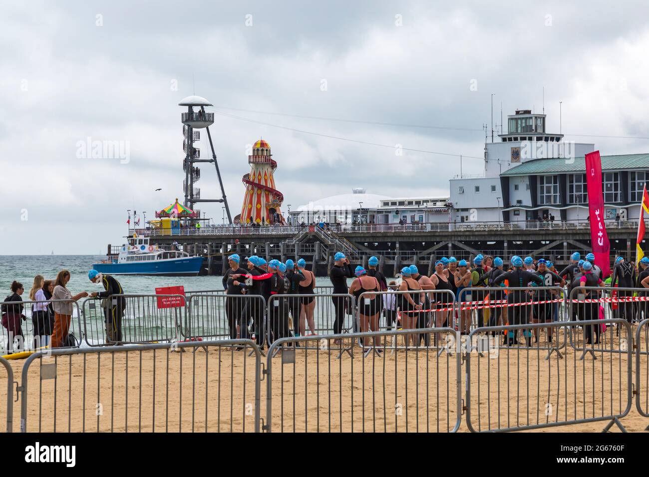 Bournemouth, Dorset UK. 3rd July 2021. Pier to Pier swim where swimmers ...