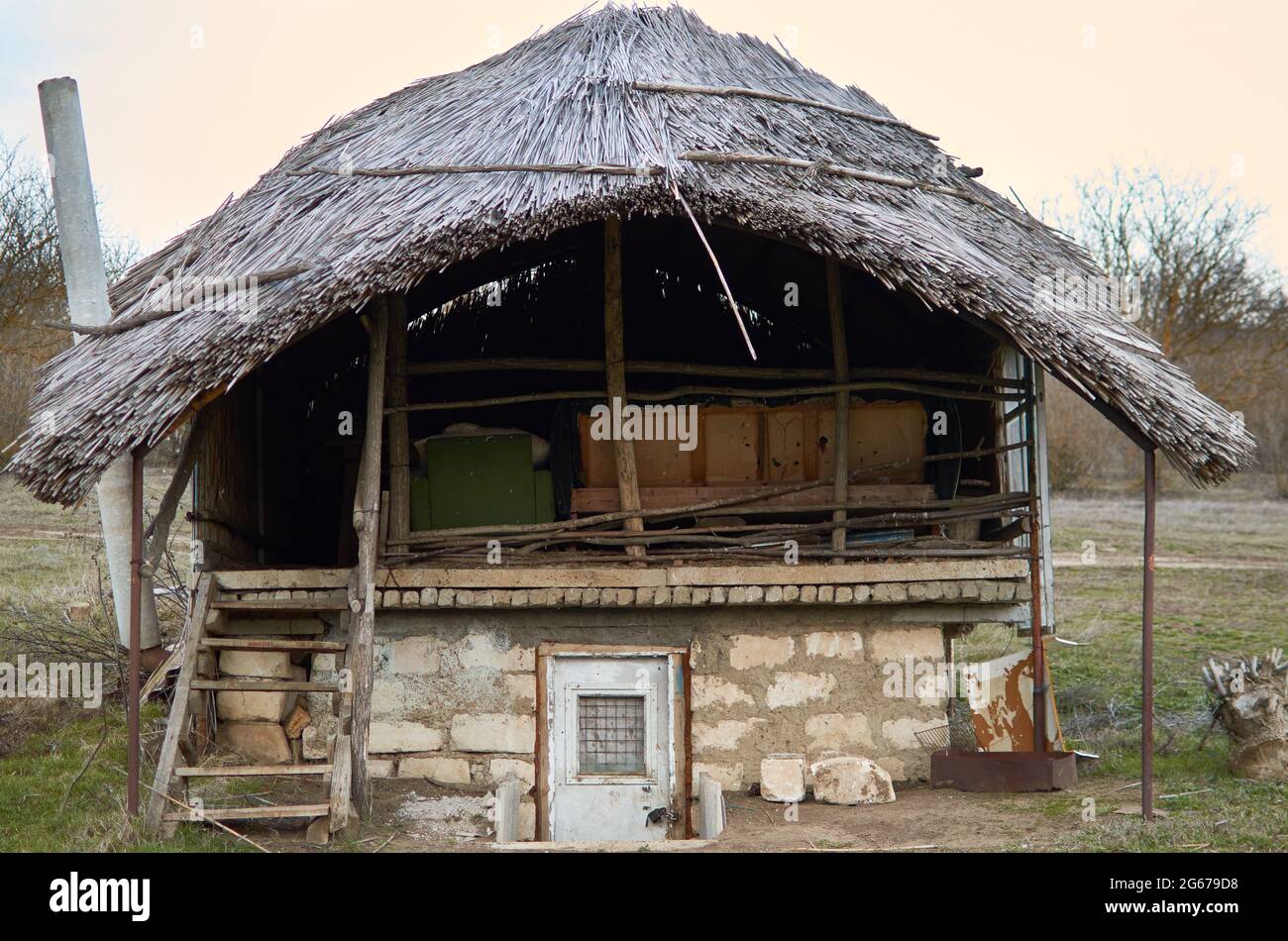 Primitive hut made of Reeds and Straw with a thatched roof Stock Photo ...