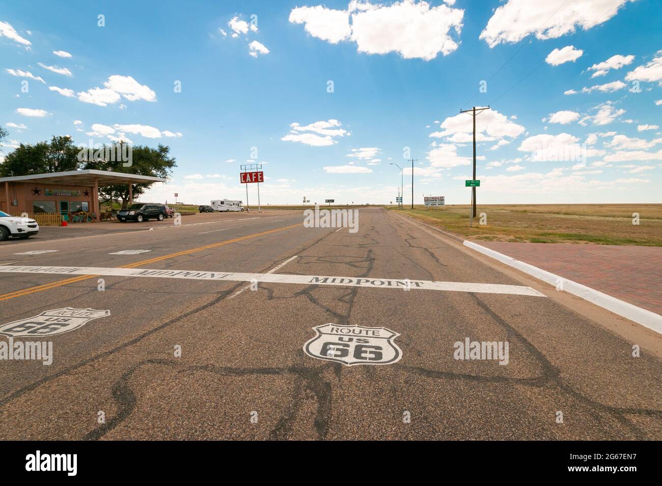 midpoint road marking on pavement surface on Route 66 Texas with cafe ...