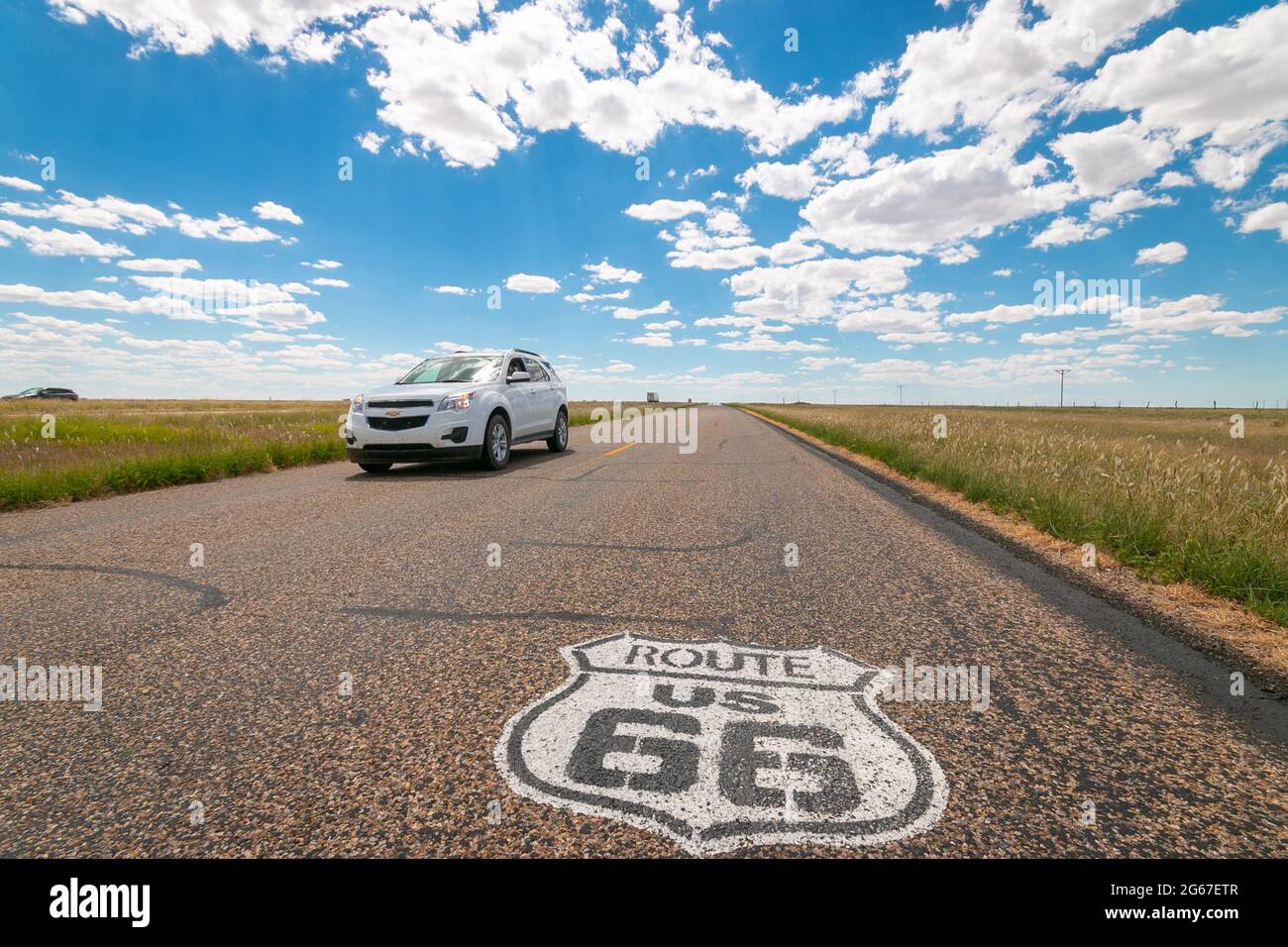 painted shield on road surface pavement on Route 66 Texas with white ...