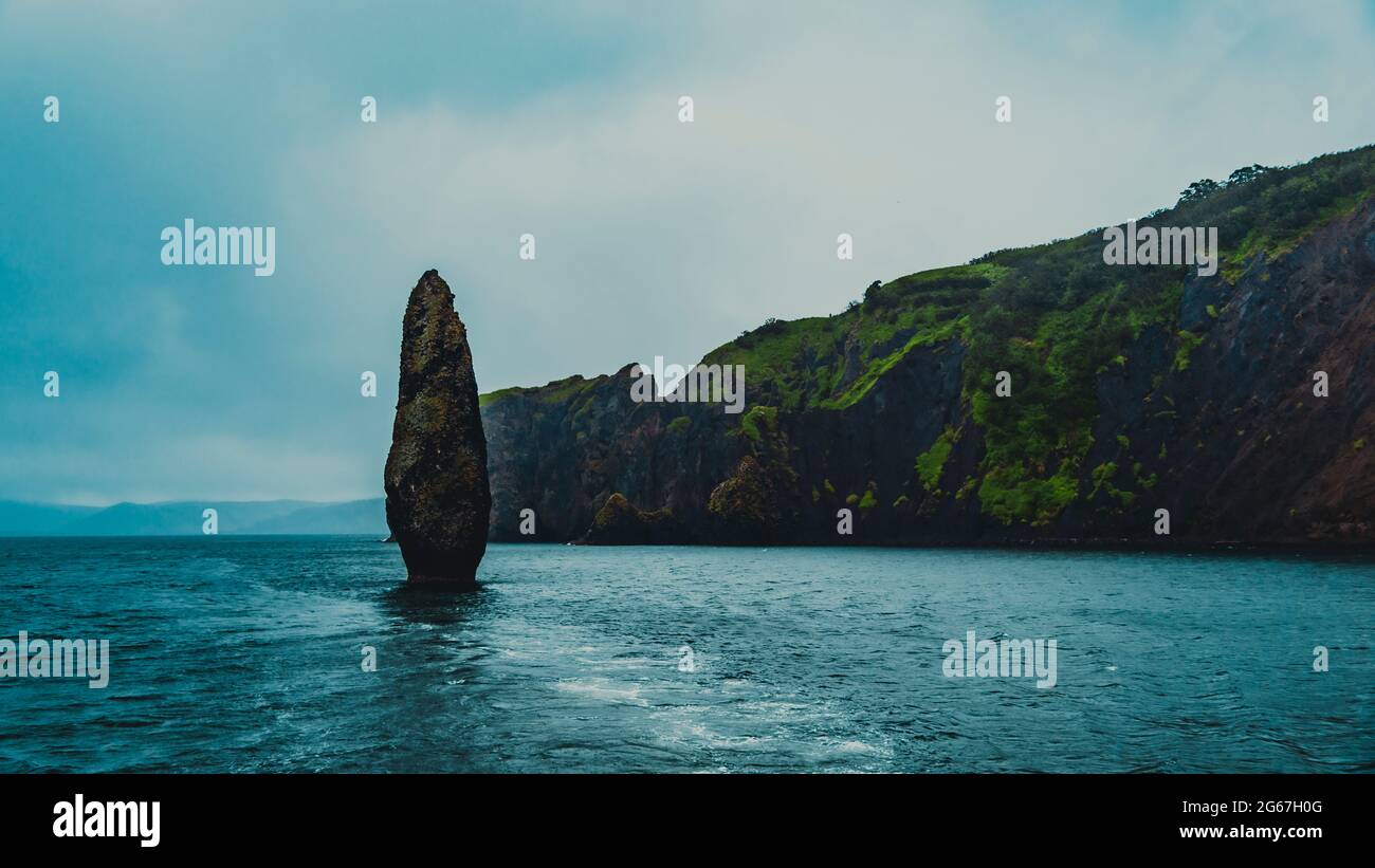 Kamchatka. The rock Devil's finger. Sentry. Avacha Bay Stock Photo - Alamy