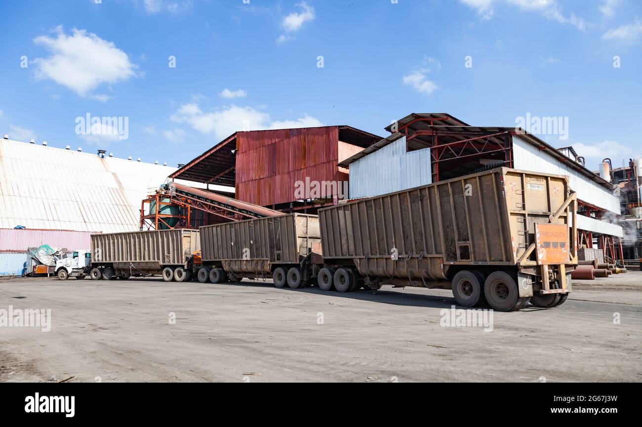 Three wagon sugar cane transporter Stock Photo - Alamy