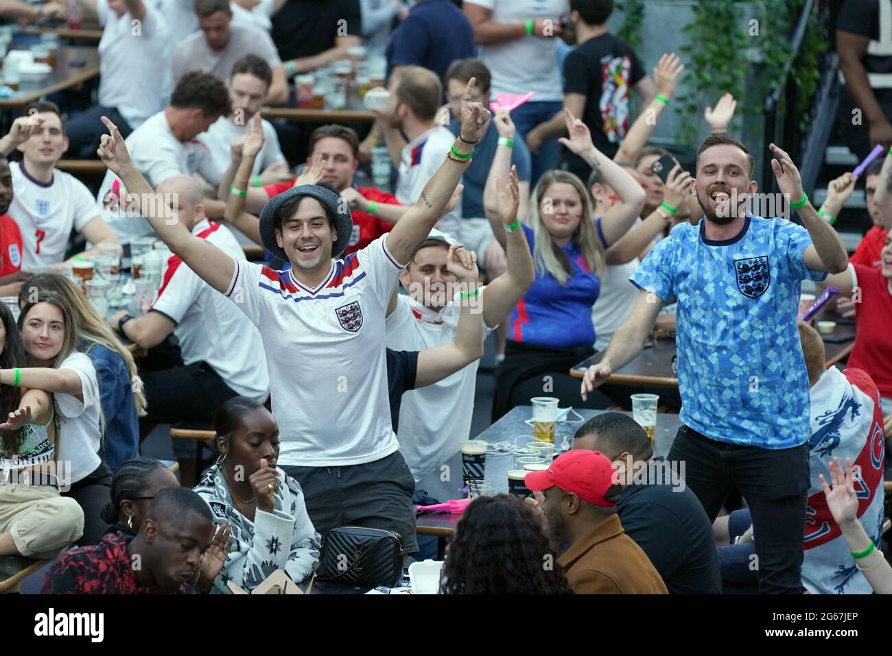 Fans in BoxPark Croydon wait for the start of the Euro2020 quarter ...