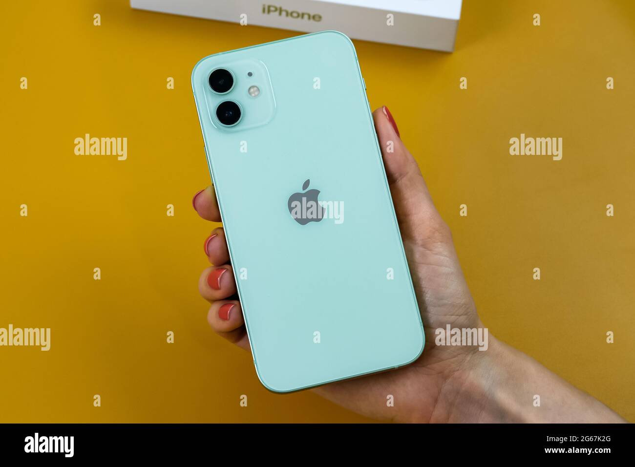 iPhone 12 in green color Stock Photo - Alamy