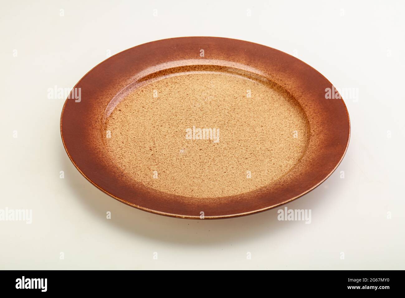 Empty color plate for kitchen isolated Stock Photo - Alamy