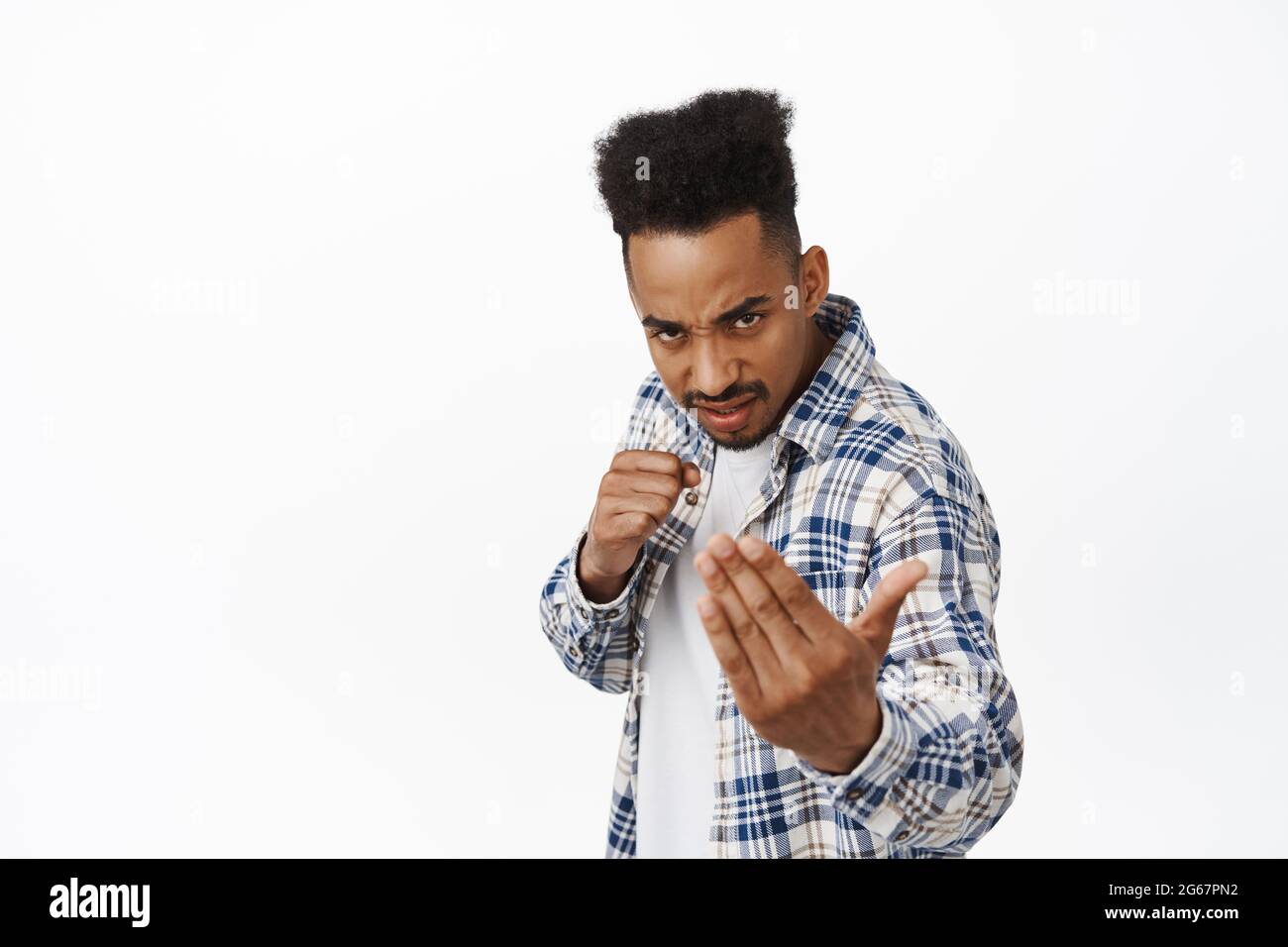 Come on, bring it. Confident african american man beckon to fight ...