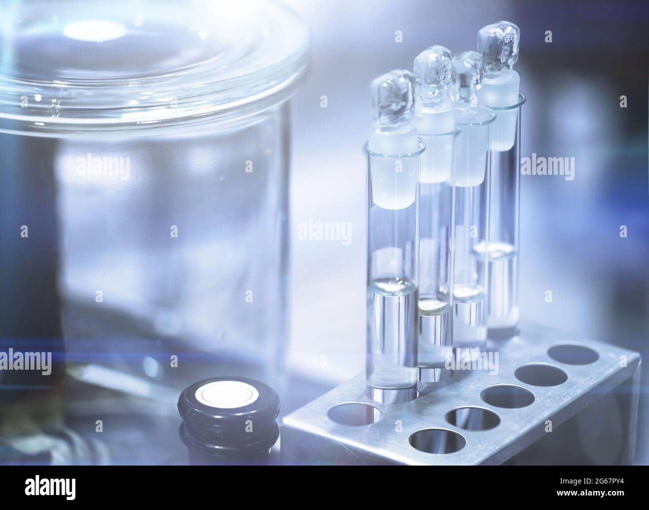 glass test tubes and jars in the lab. concept of medicine and science ...