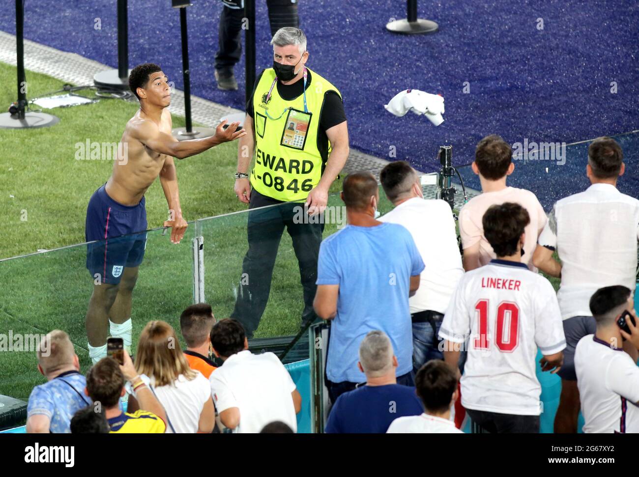 England's Jude Bellingham throws his shirt to the crowd after the UEFA ...
