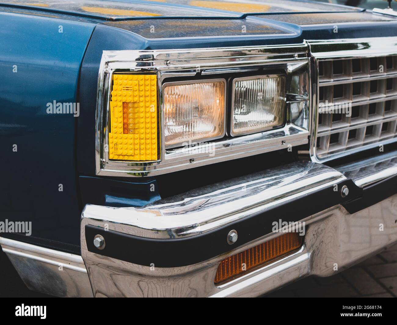 Self-made car headlamp. Vehicle headlamp made of yellow toy blocks ...