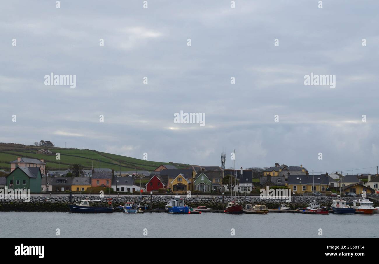 Colorful houses lining the harbor of Dingle Ireland Stock Photo - Alamy
