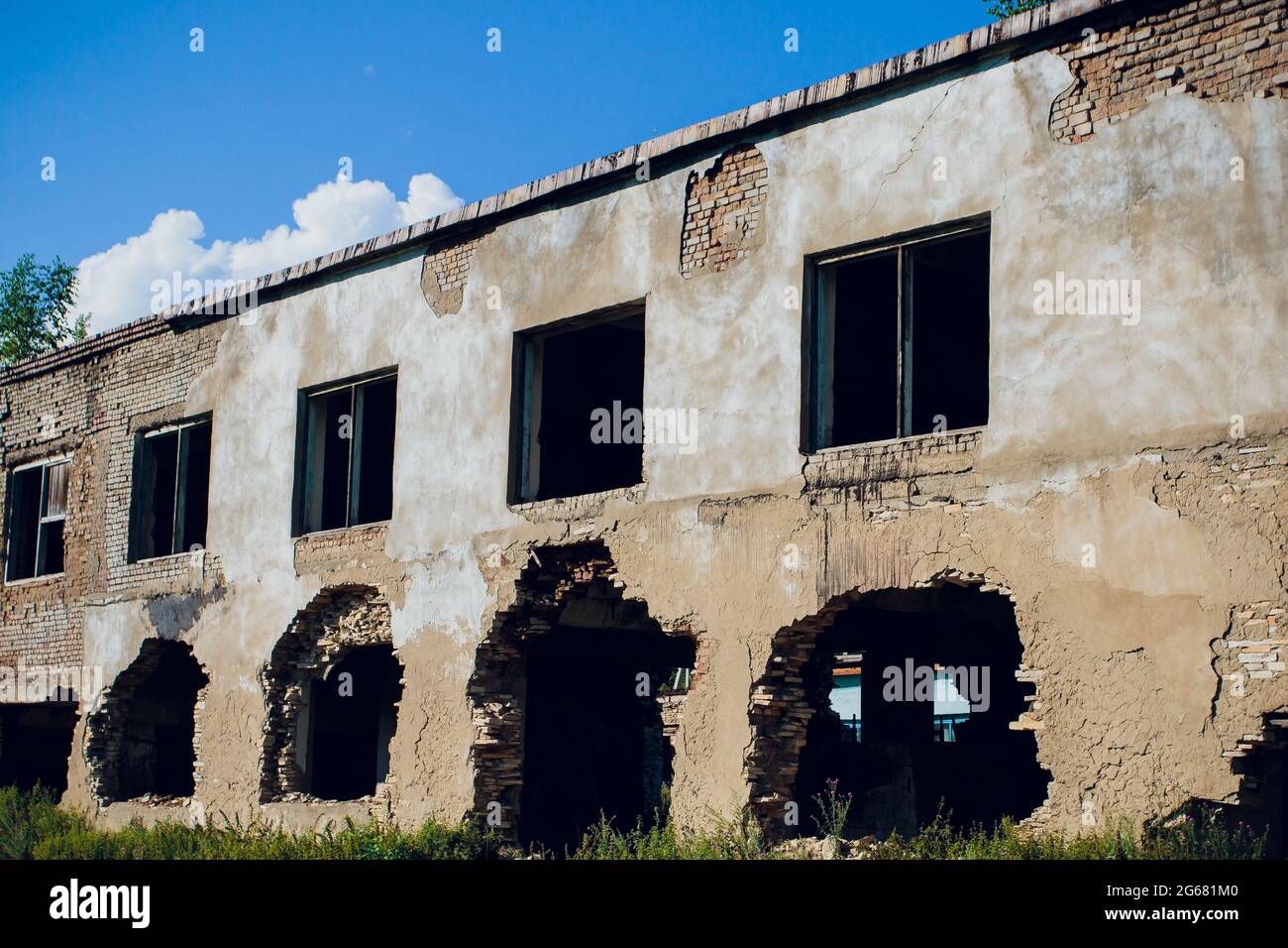 Landscape of ruined buildings at sunset, image of decrepitude or ...
