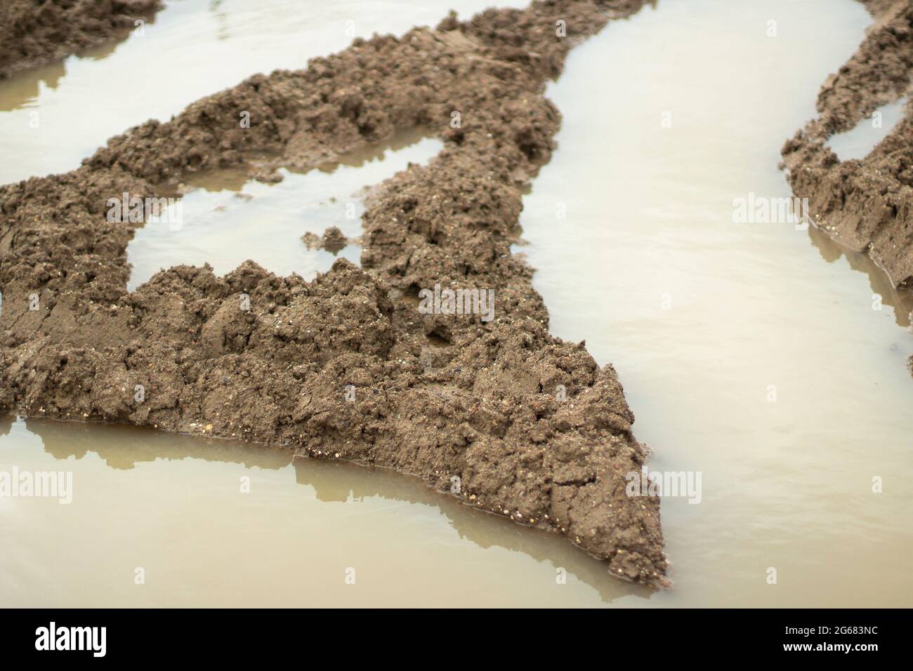 Dirt at a construction site. Dirty road. Off-road after a rainstorm ...