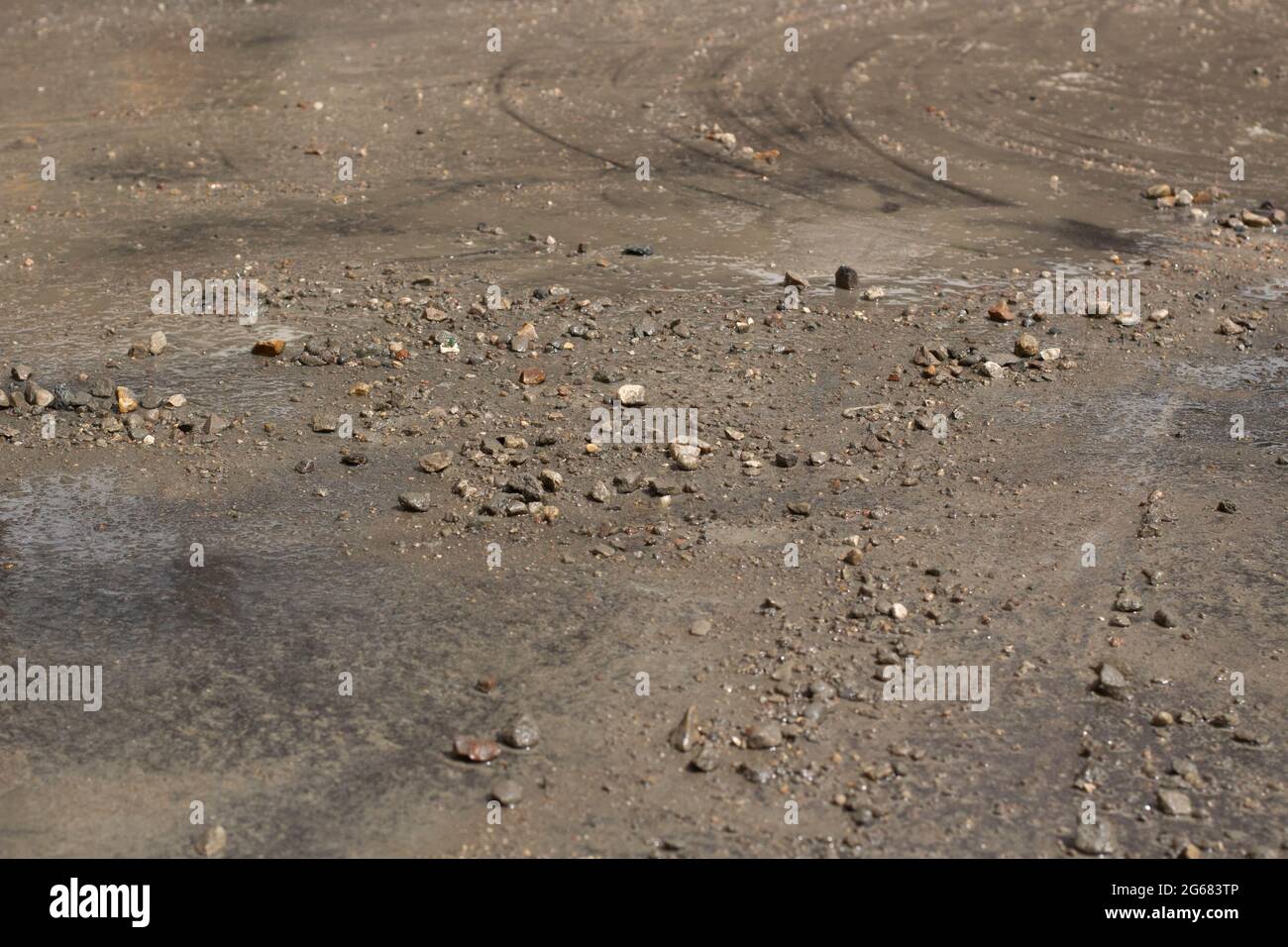 Dirt on the ground. Scattered soil. The road after construction. Stones ...