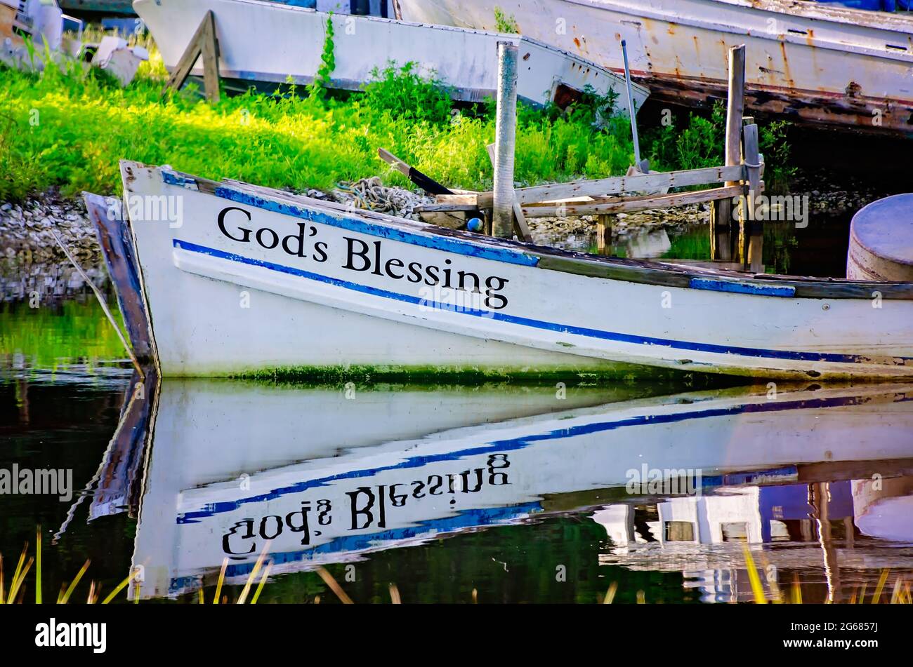 A splintered fishing boat is pictured near other damaged boats, July 1 ...
