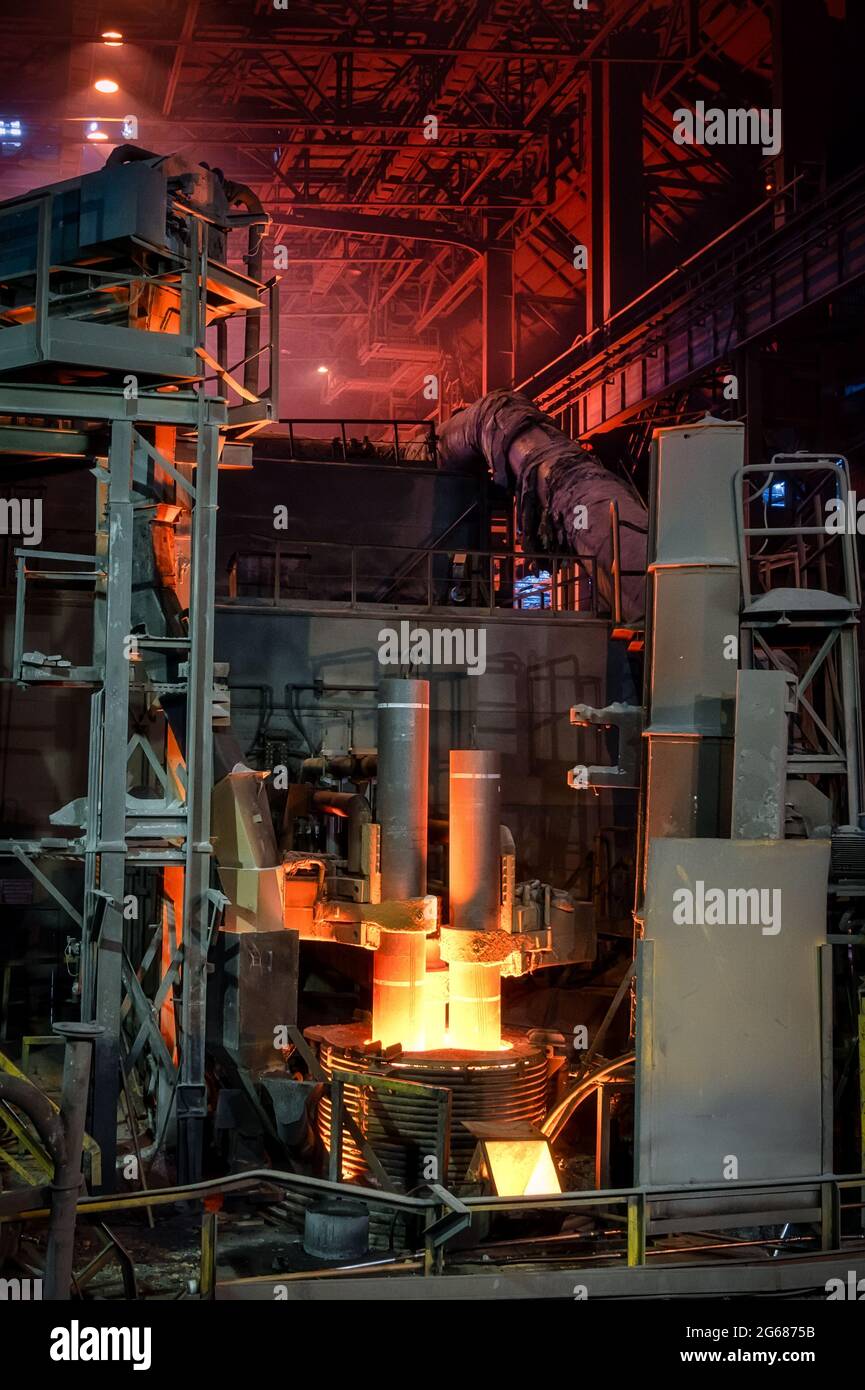 Electric steel furnace, glowing graphite electrodes Stock Photo - Alamy
