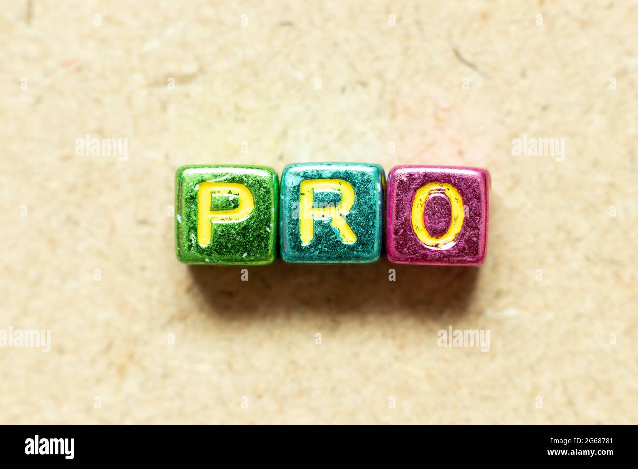 Metallic color alphabet letter block in word pro on wood background ...
