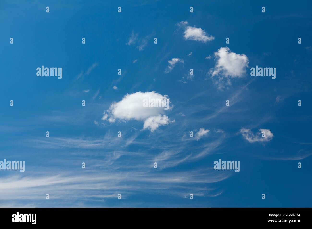 Generic white clouds on the blue sky . Summer daytime clouds Stock ...