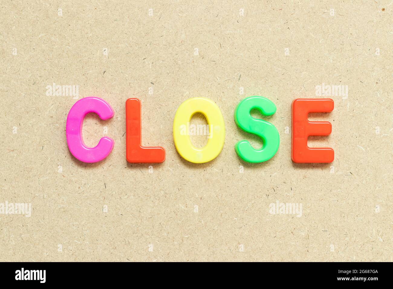 Color alphabet letter with word close on wood background Stock Photo ...