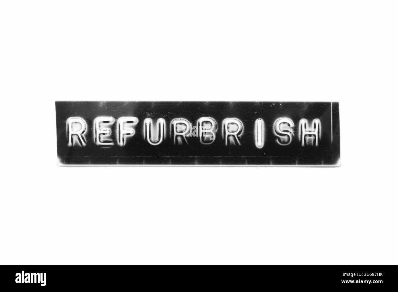 Embossed letter with word refurbrish in black banner on white paper ...